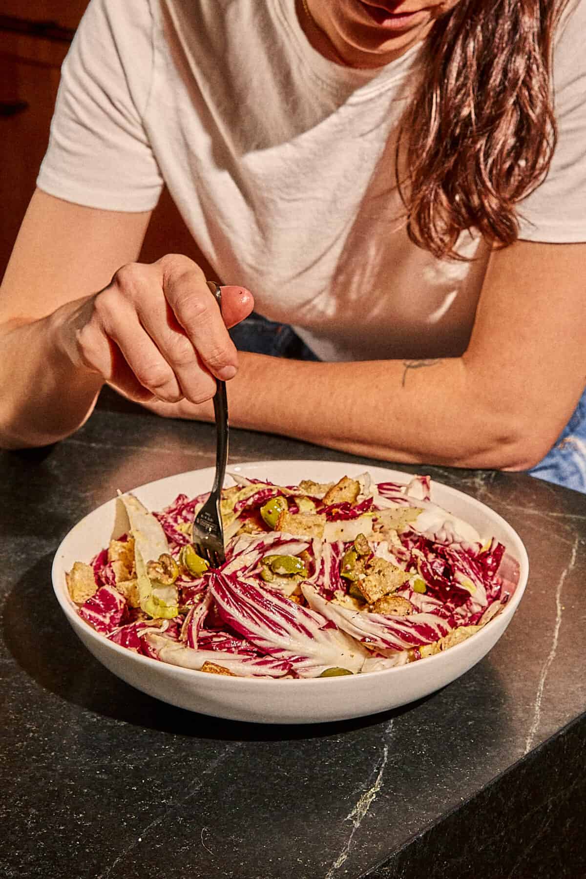 Bitter Green Caesar Salad with Roasted Olive Croutons