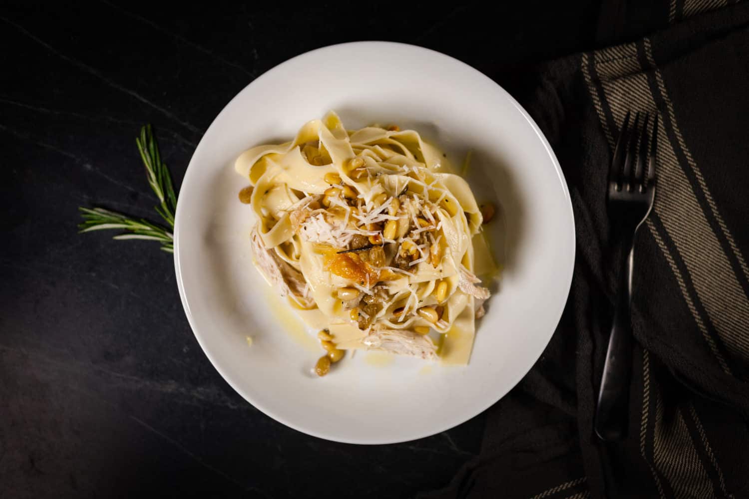 Chicken Tagliatelle Recipe with Pine Nuts and Golden Raisins