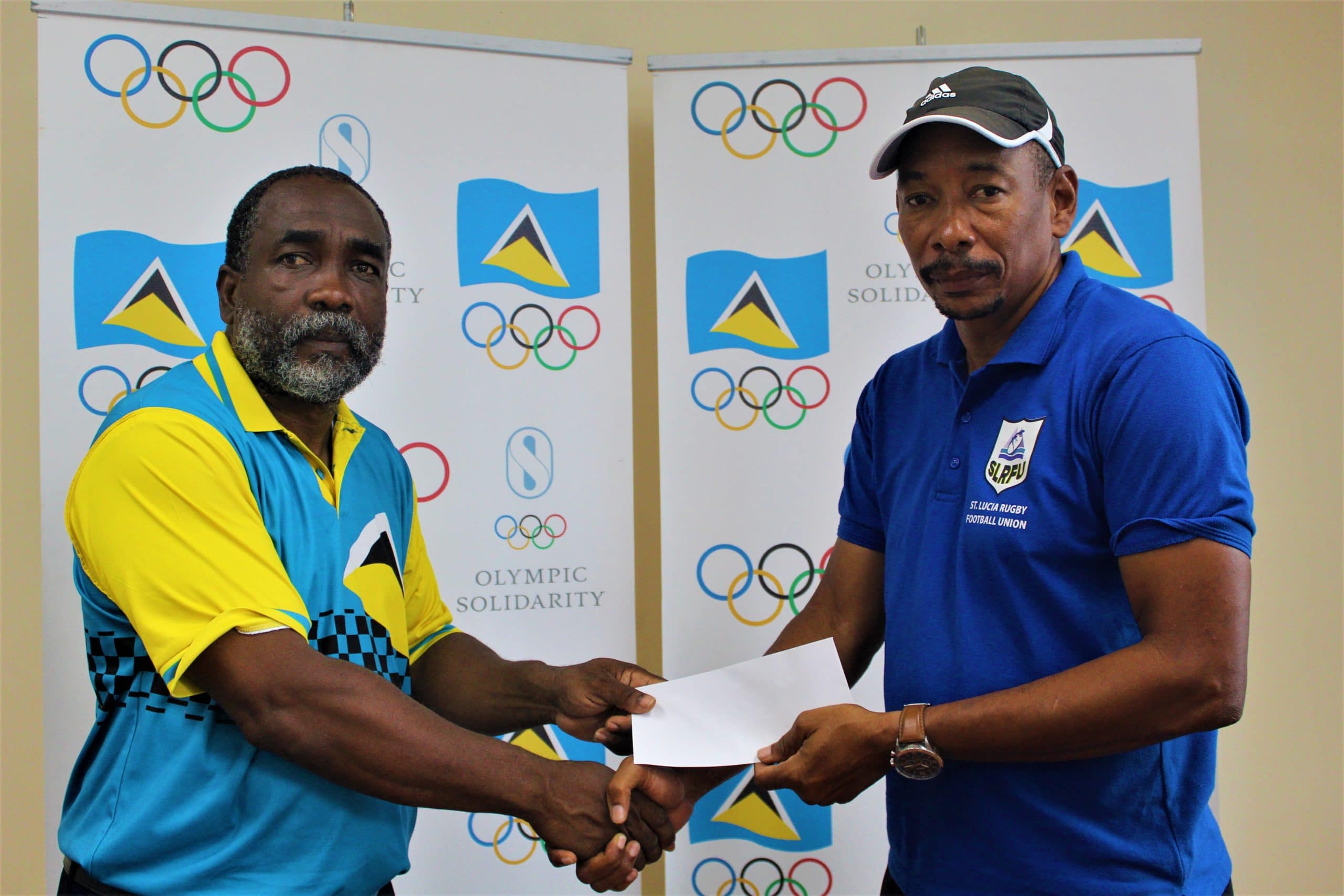 SLOC Inc.'s handover of funds to the St. Lucia Cycling Association and ...