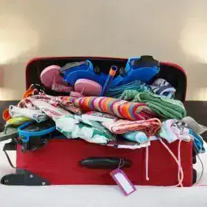 overstuffed suitcase