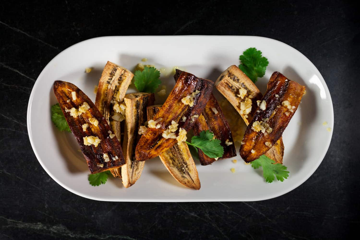 Baked Plantains with Garlic and Butter