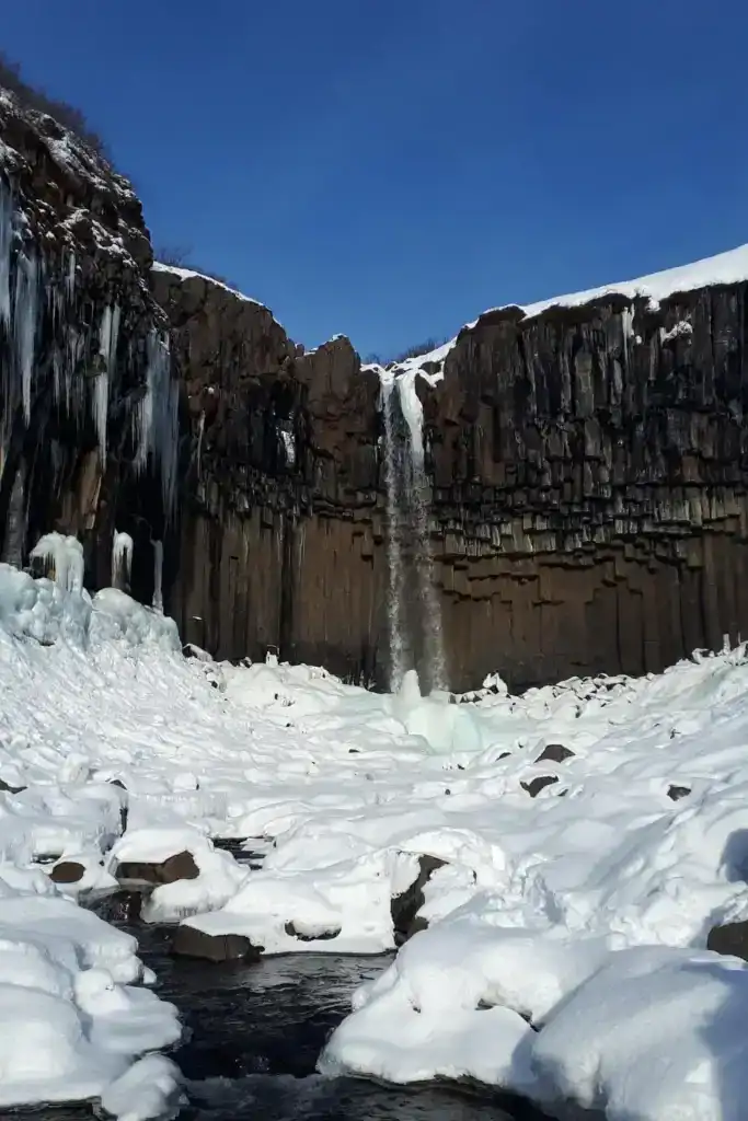 svartifoss waterfall winter
