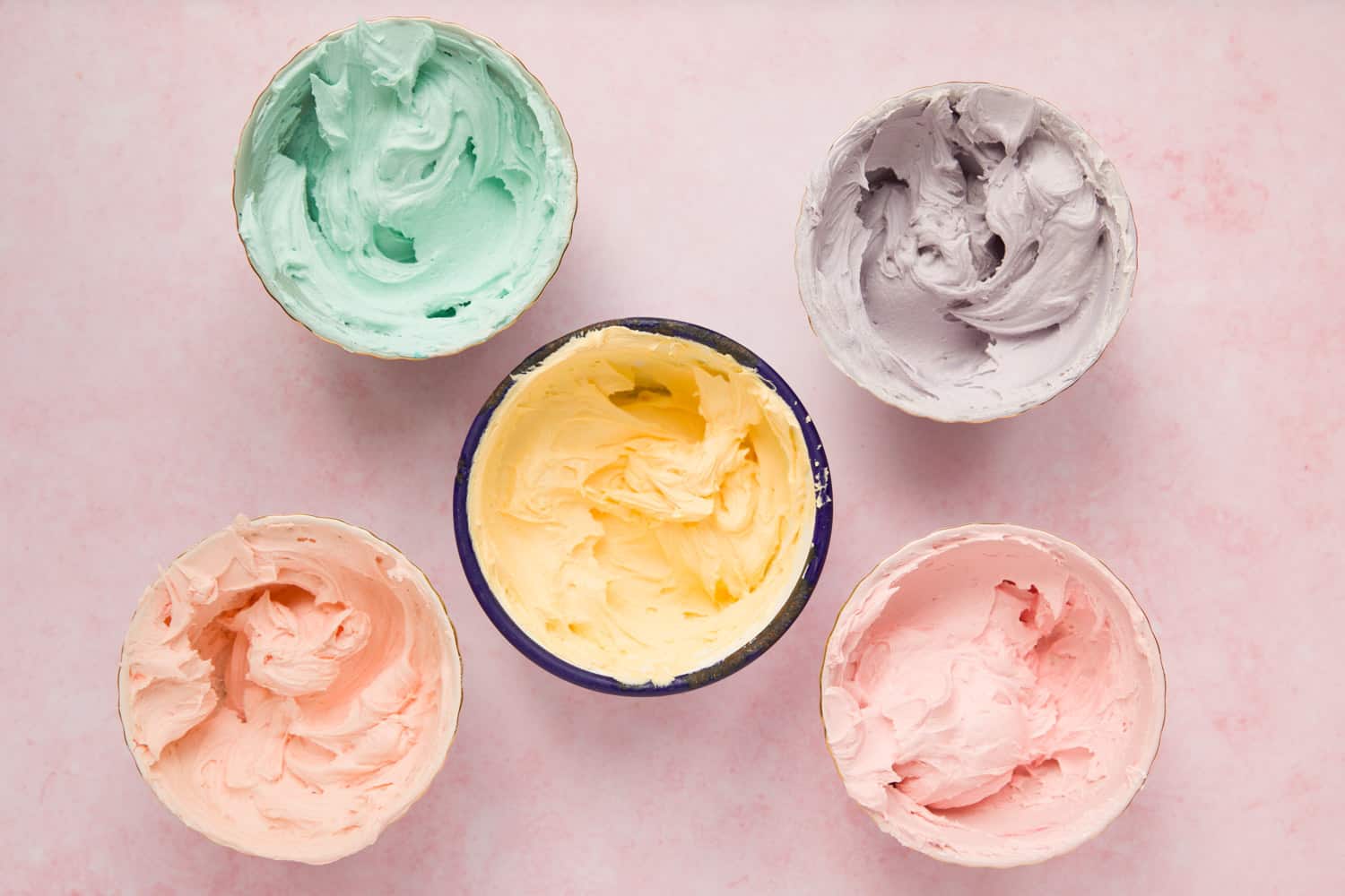 Piñata Cupcakes with Rainbow Icing